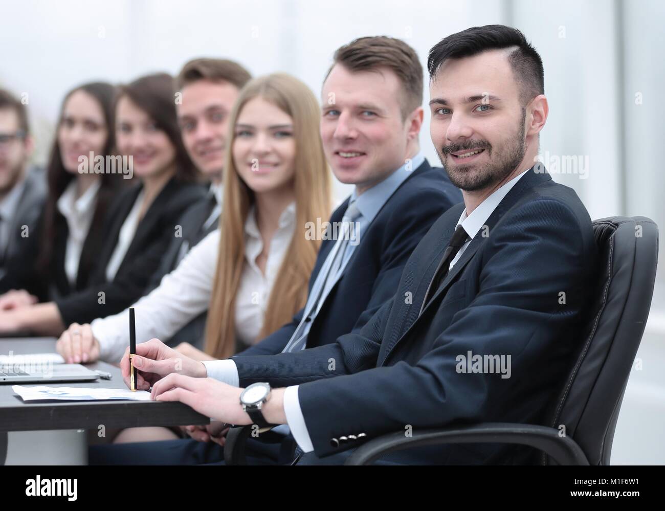 business team sitting at Desk in the conference room Stock Photo - Alamy