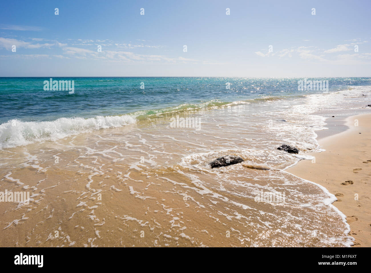 Sandy beach and blue green sea hi-res stock photography and images - Alamy