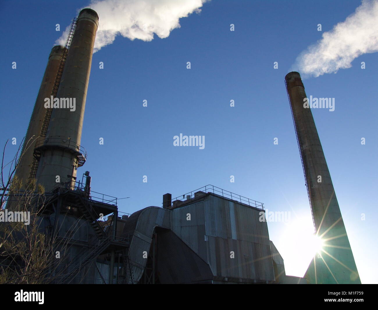 Climate change, global warming. Factory, chimney, smoke, steam, CO2 ...