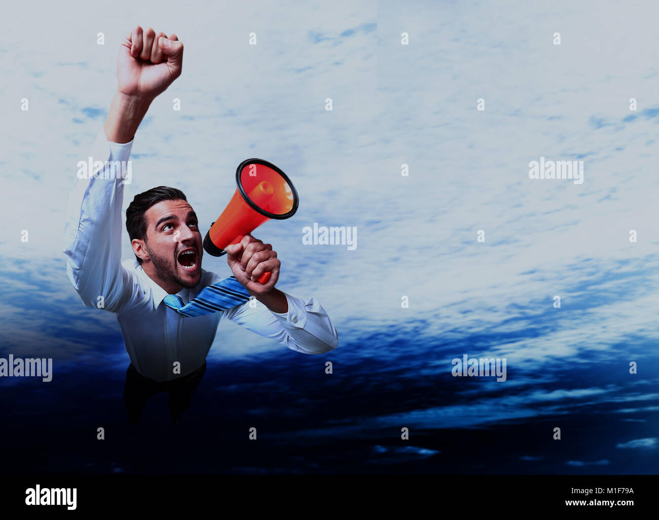 Happy businessman flying in the sky Stock Photo - Alamy