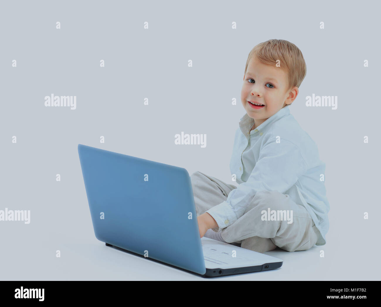happy boy using the computer Stock Photo - Alamy