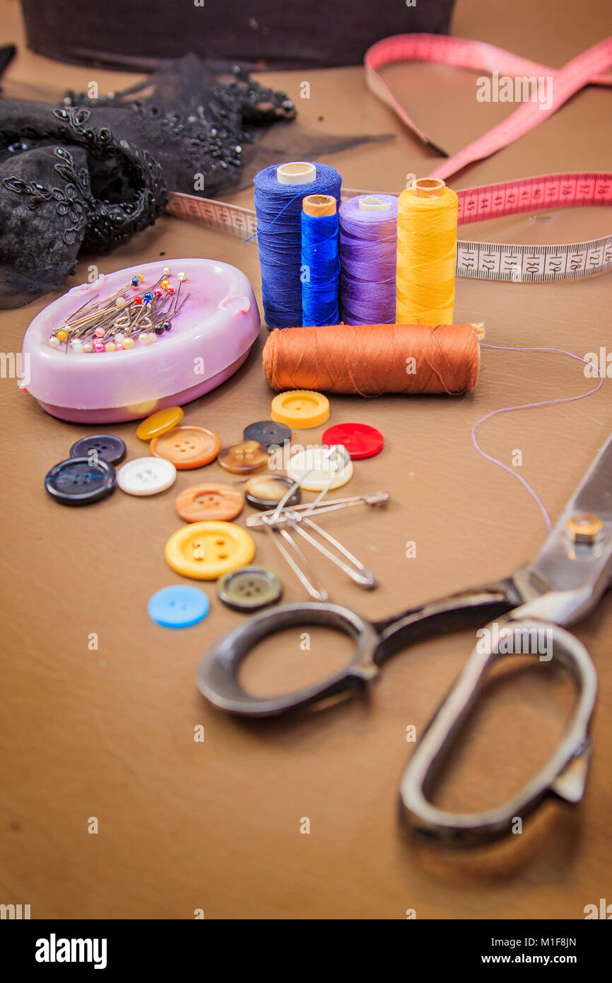 Clothing accessories,thread, scissors and measuring tape Stock Photo ...
