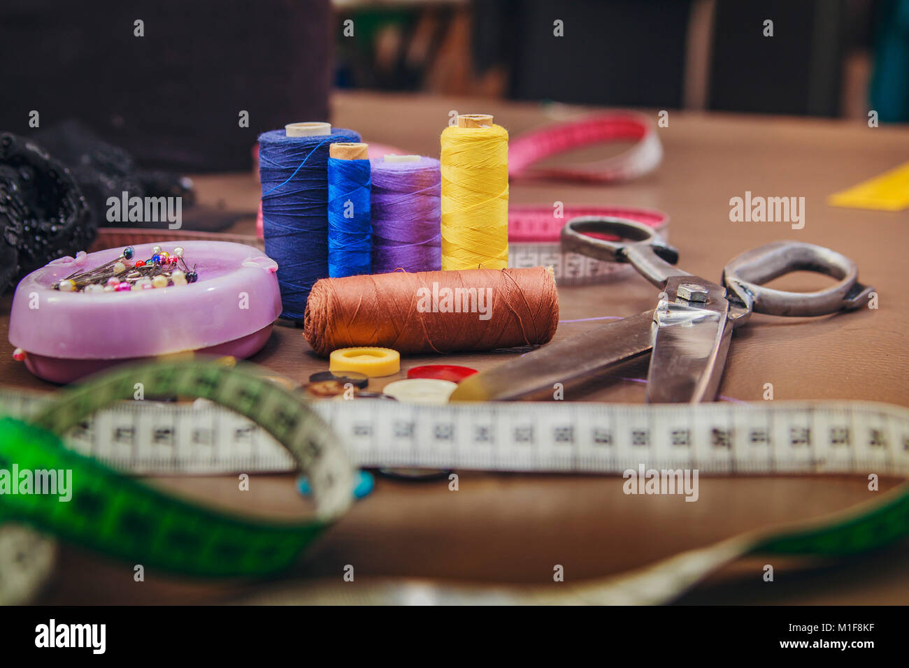 Clothing accessories,thread, scissors and measuring tape Stock Photo ...