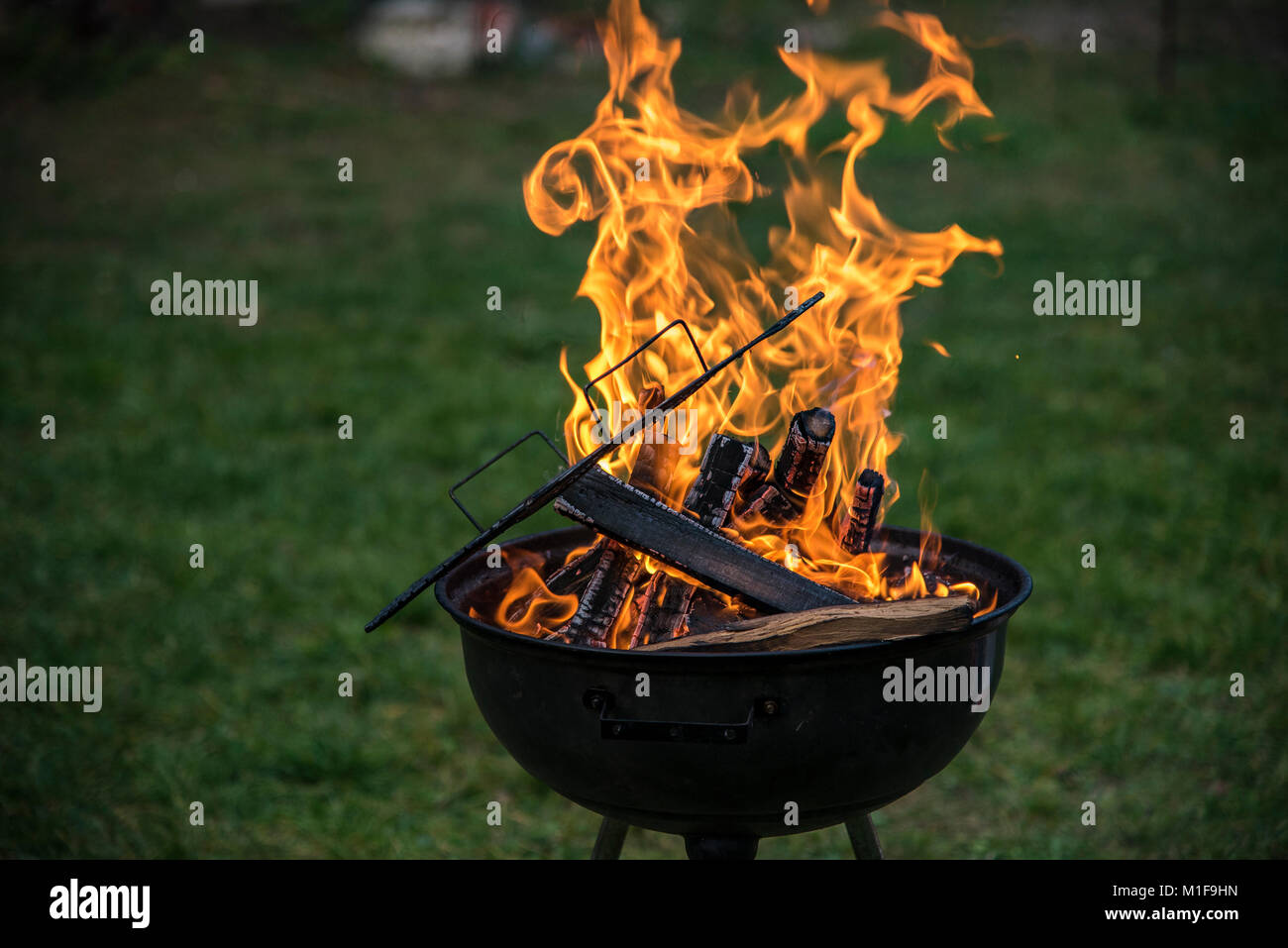 Fire wood burning backyard grill hi-res stock photography and images ...