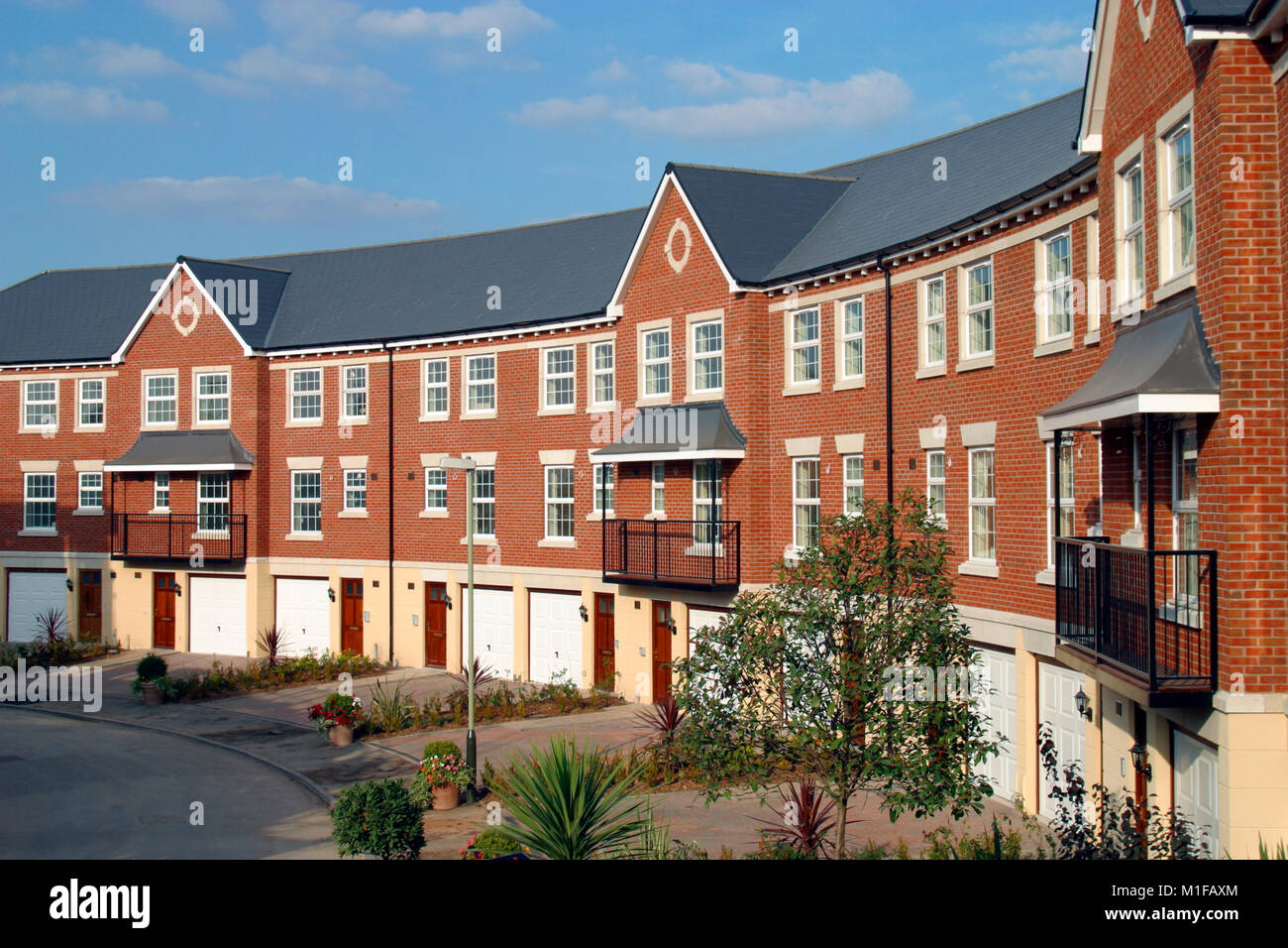 Modern style terrace town house property development Stock Photo - Alamy