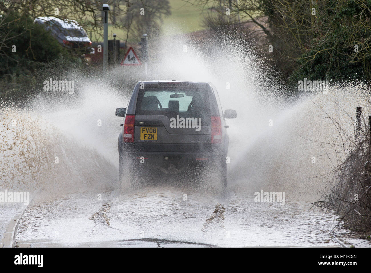 Vehicles going through flooded hi-res stock photography and images - Alamy