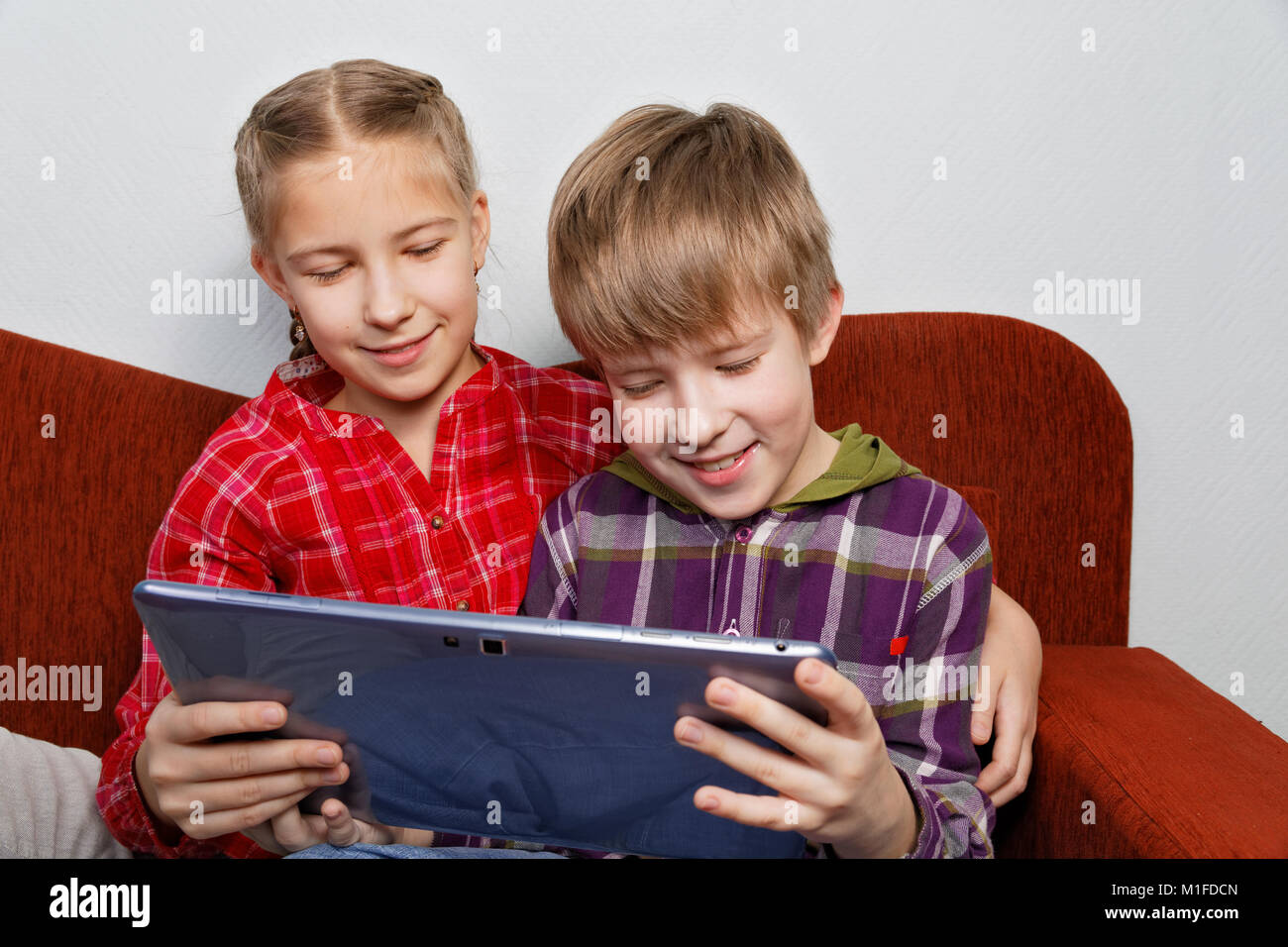 Modern children's entertainment - the game on a Tablet PC Stock Photo ...