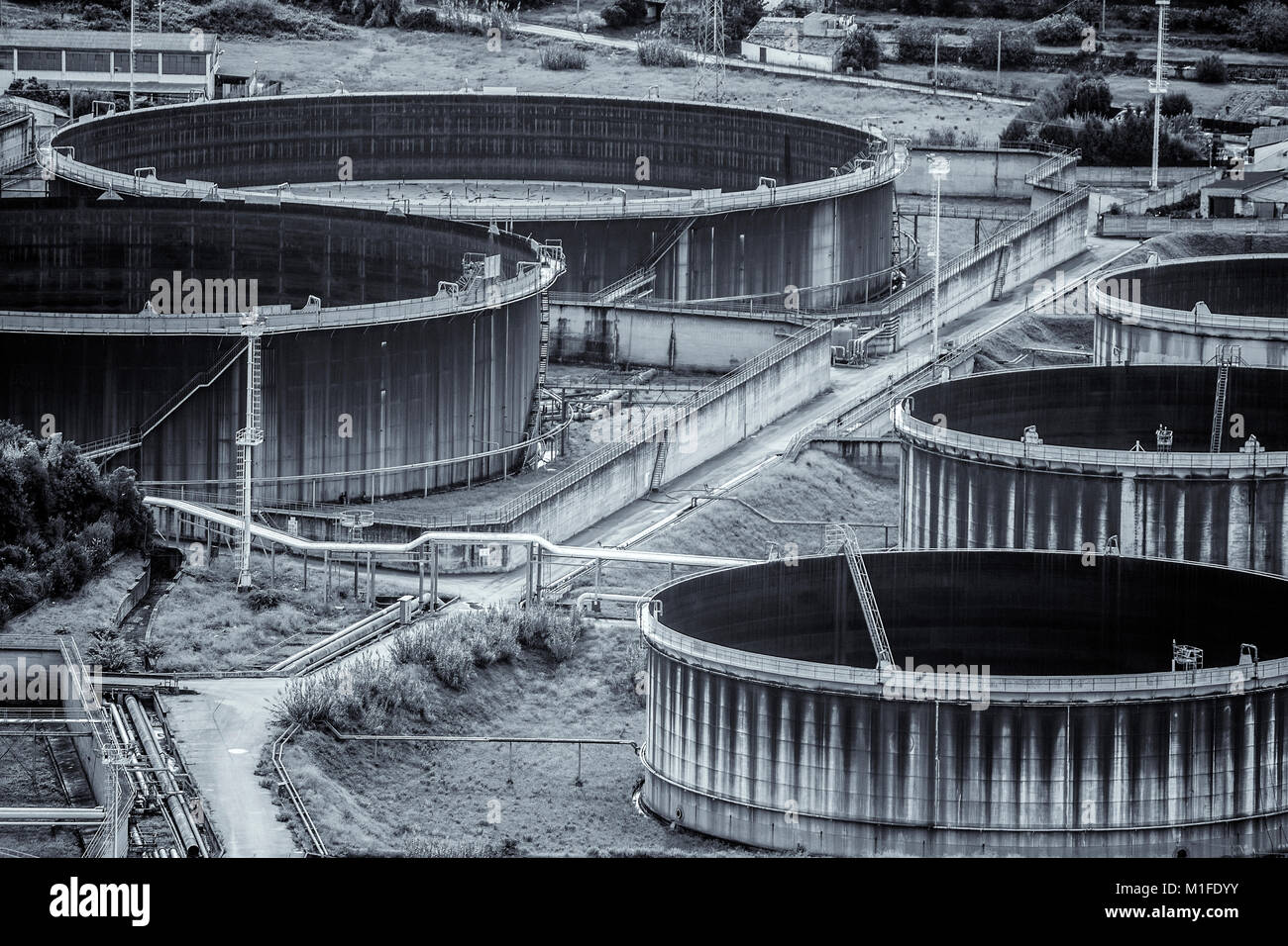 Storage tanks in refinery Stock Photo - Alamy
