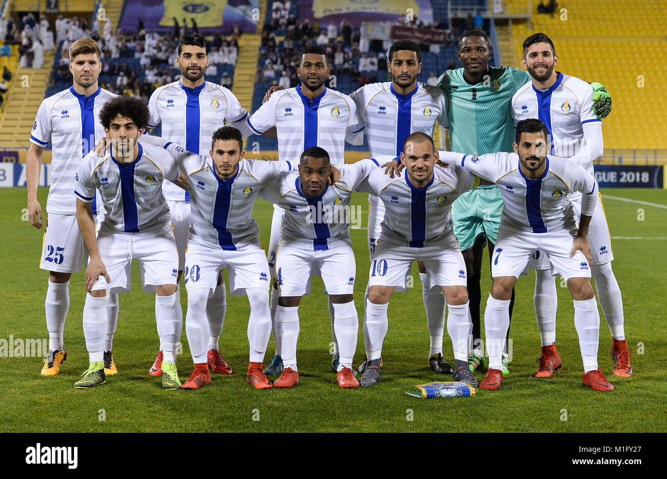 Doha. 30th Jan, 2018. Players of Qatar's Al-Gharafa line up ahead of ...