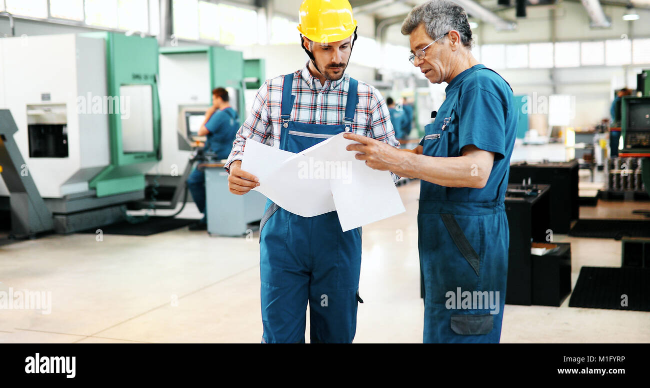 Portrait of an handsome engineer in a factory Stock Photo - Alamy