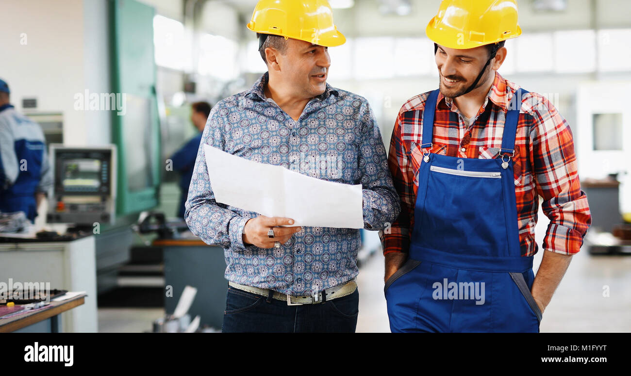 Portrait of an handsome engineer in a factory Stock Photo - Alamy
