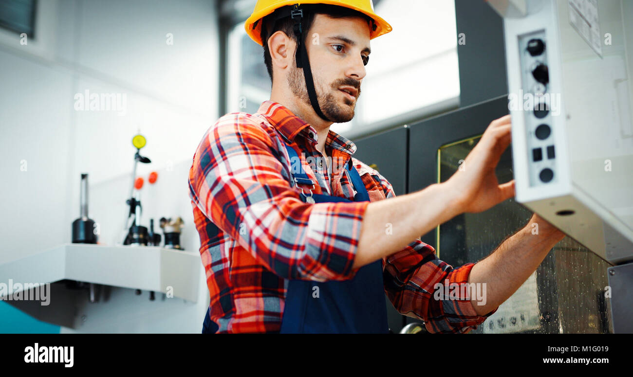 Portrait of an handsome engineer in a factory Stock Photo - Alamy