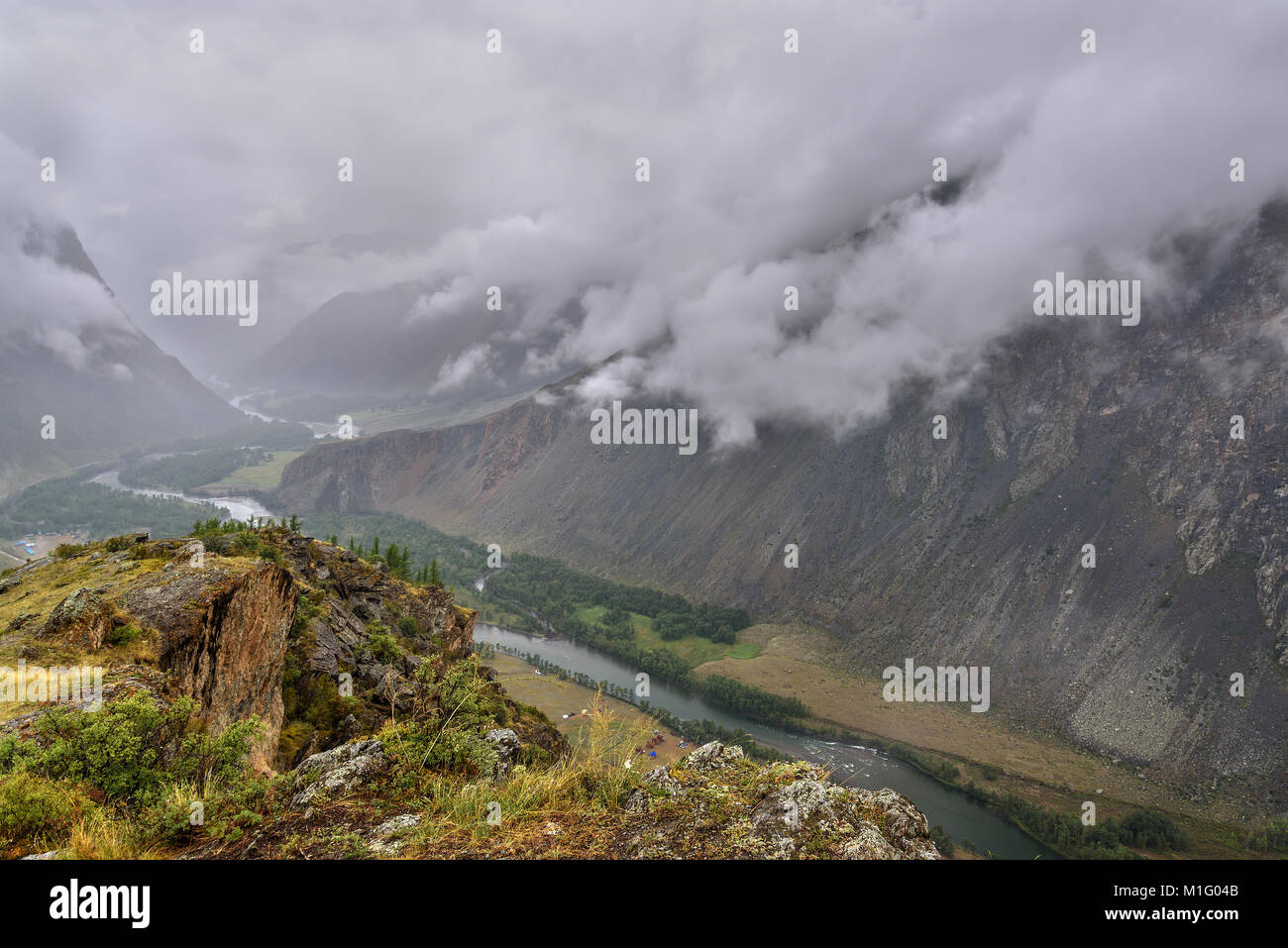 Scenic top view on mountains, valley between mountains, forest, winding ...