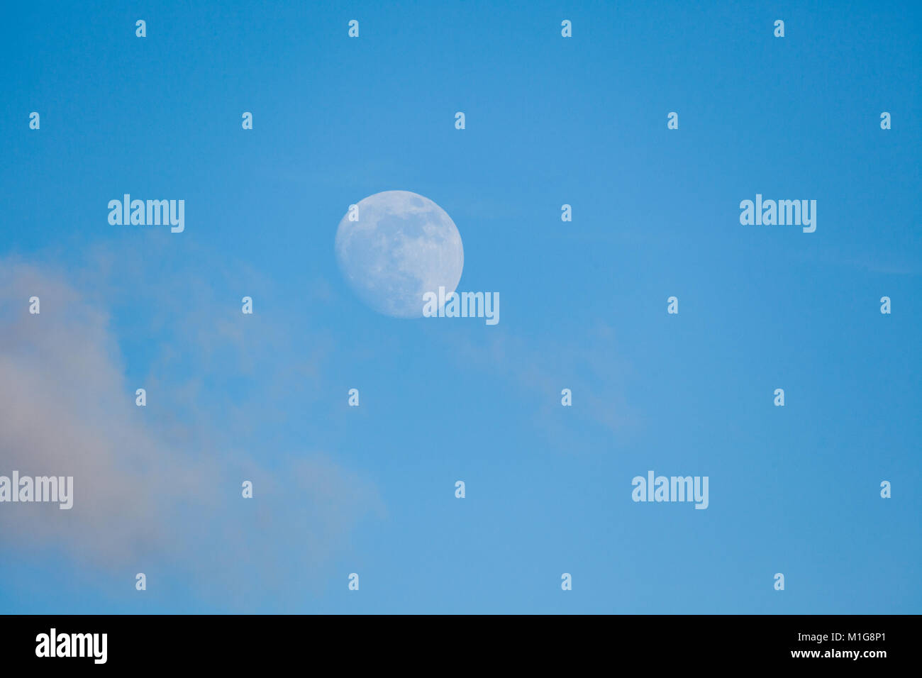 Full moon behind cloud hi-res stock photography and images - Alamy