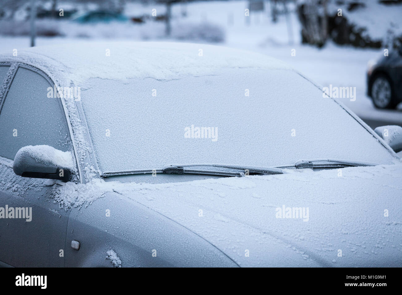 Car covered in frost Stock Photo - Alamy