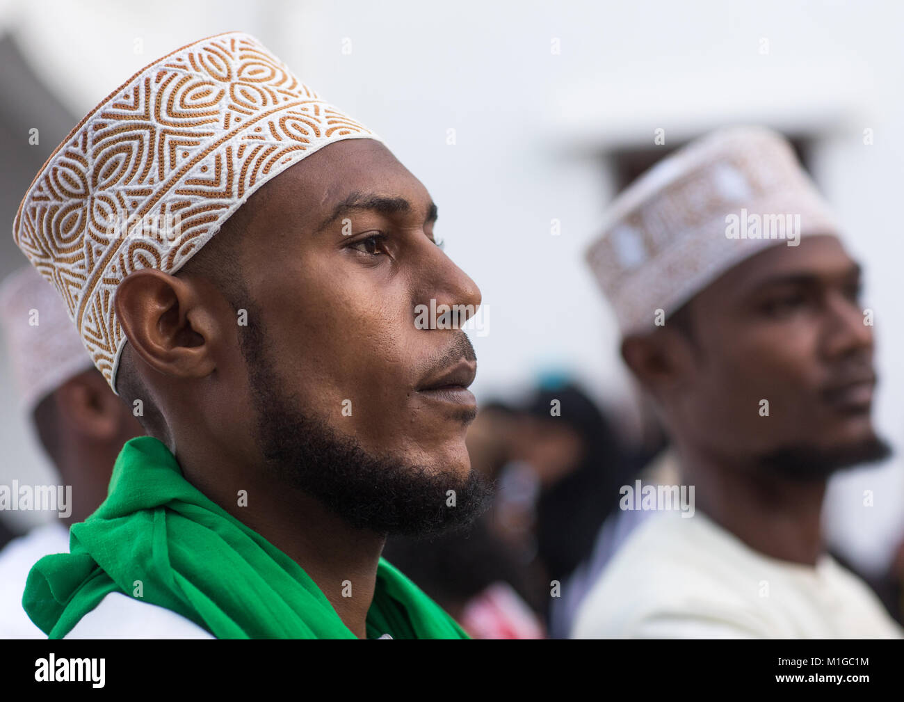 Sunni muslim men celebrating the Maulidi festivities in the street ...