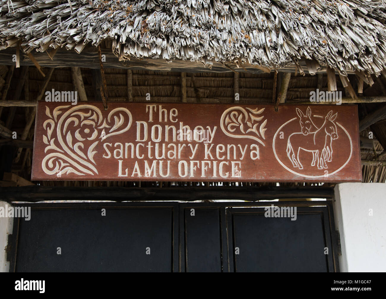 A sign for the the donkey sanctuary, Lamu County, Lamu Town, Kenya ...