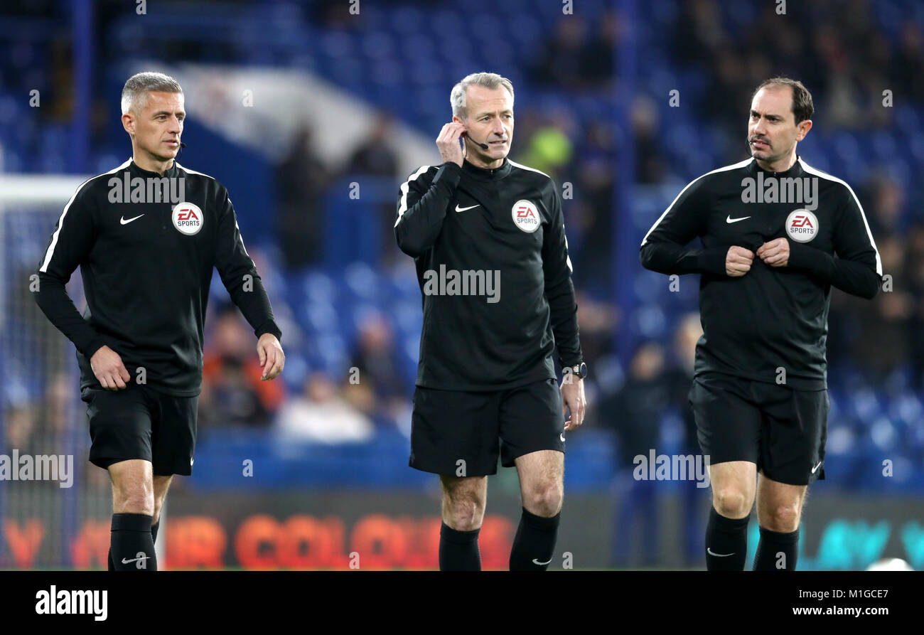 Match referee Martin Atkinson (centre) and assistant referees Stephen ...