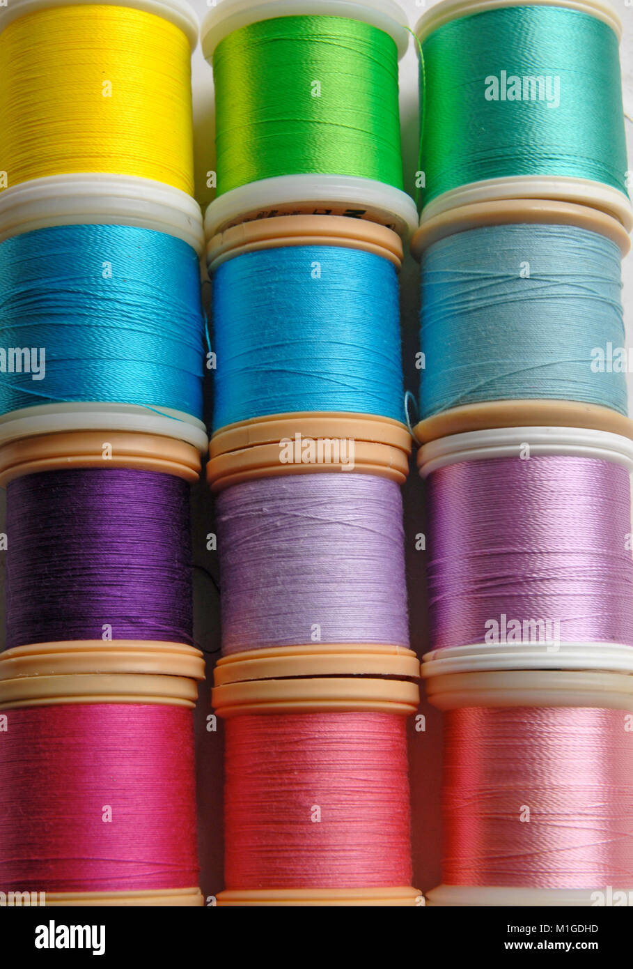 Display of pretty colored cotton reels Stock Photo - Alamy