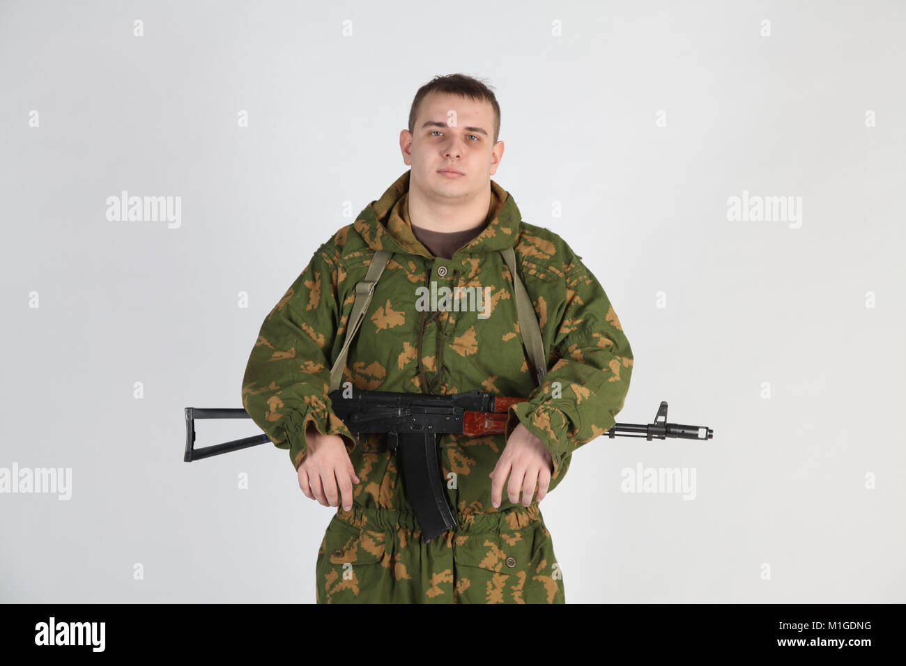 Russian soldier in camouflage with gun Stock Photo - Alamy