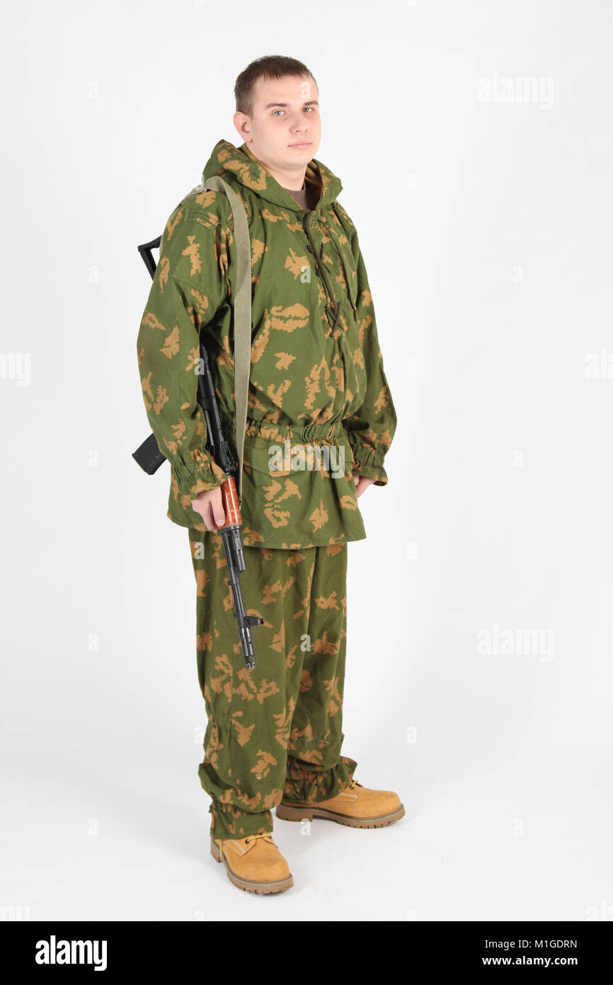 Russian soldier in camouflage with gun Stock Photo - Alamy