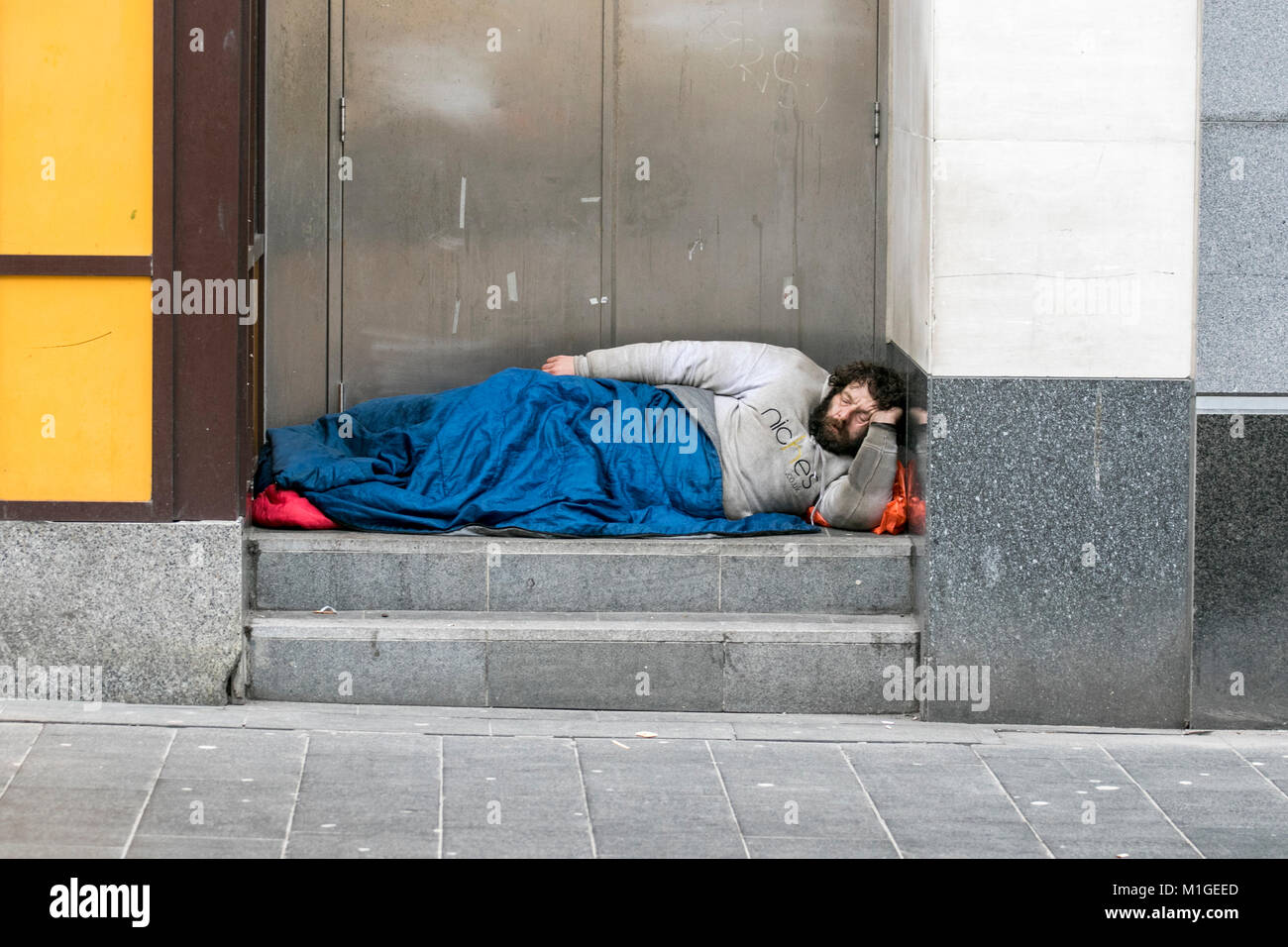 Homeless man, homelessness sleeping rough beg beggar hungry cold winter ...
