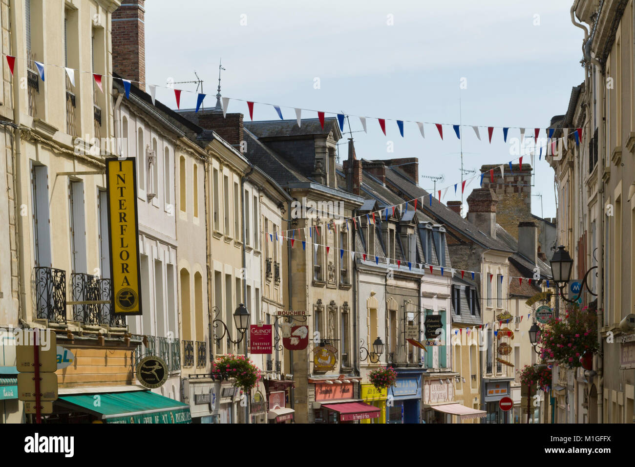 Sees, Normandy, France - 19th September 2014: Typical shopping street ...