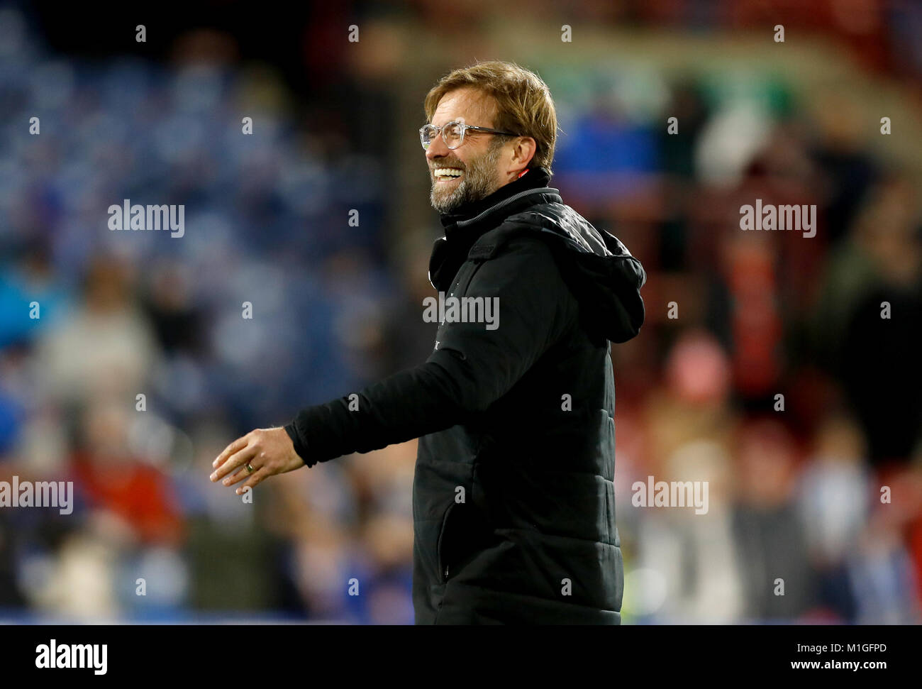 Liverpool manager Jurgen Klopp laughs on the pitch before the Premier ...