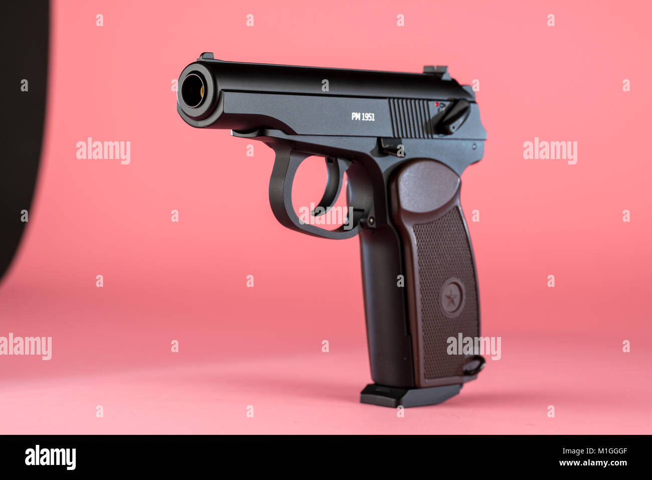 Gun isolated on white background Stock Photo - Alamy