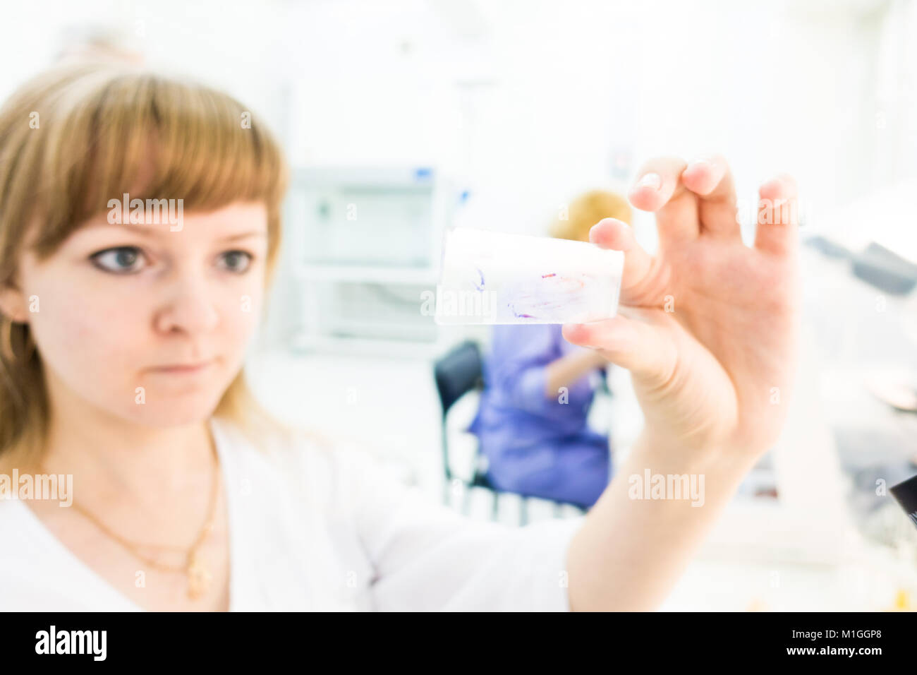 The technician in a medical laboratory Stock Photo - Alamy