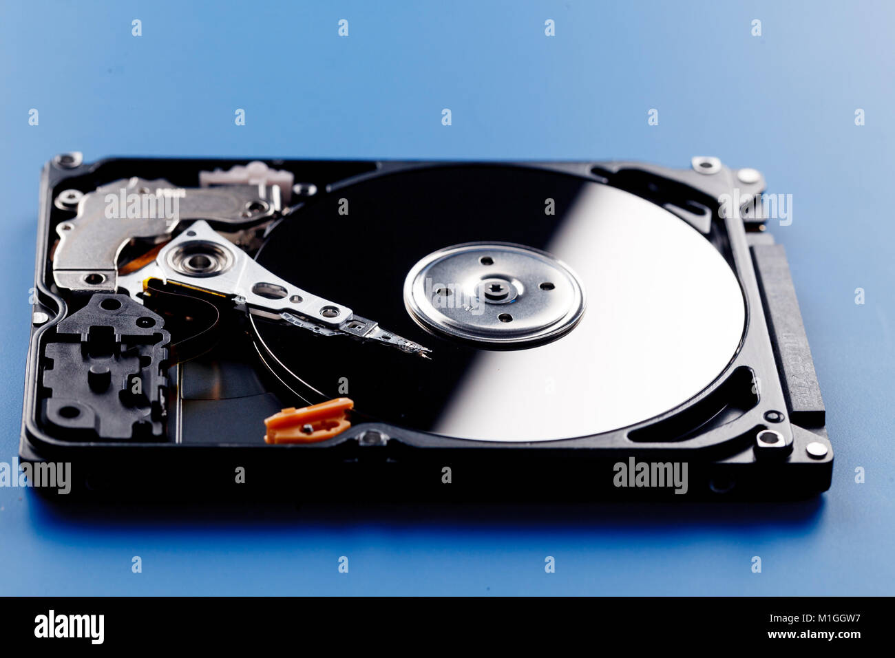 Open HDD on a blue background Stock Photo - Alamy