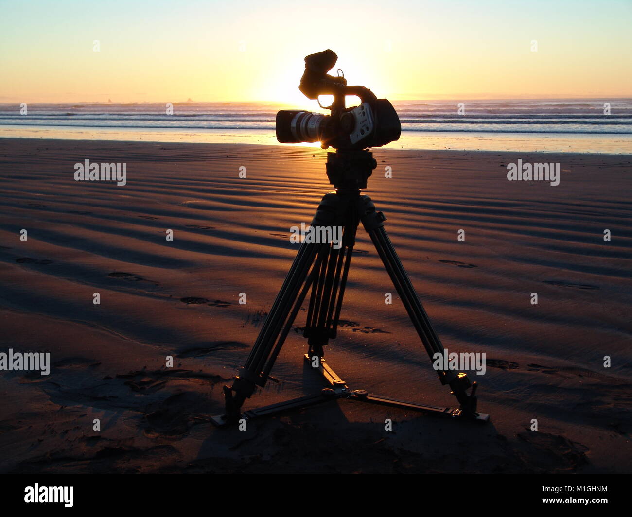 Digital Video Camera on beach during sunset Stock Photo - Alamy