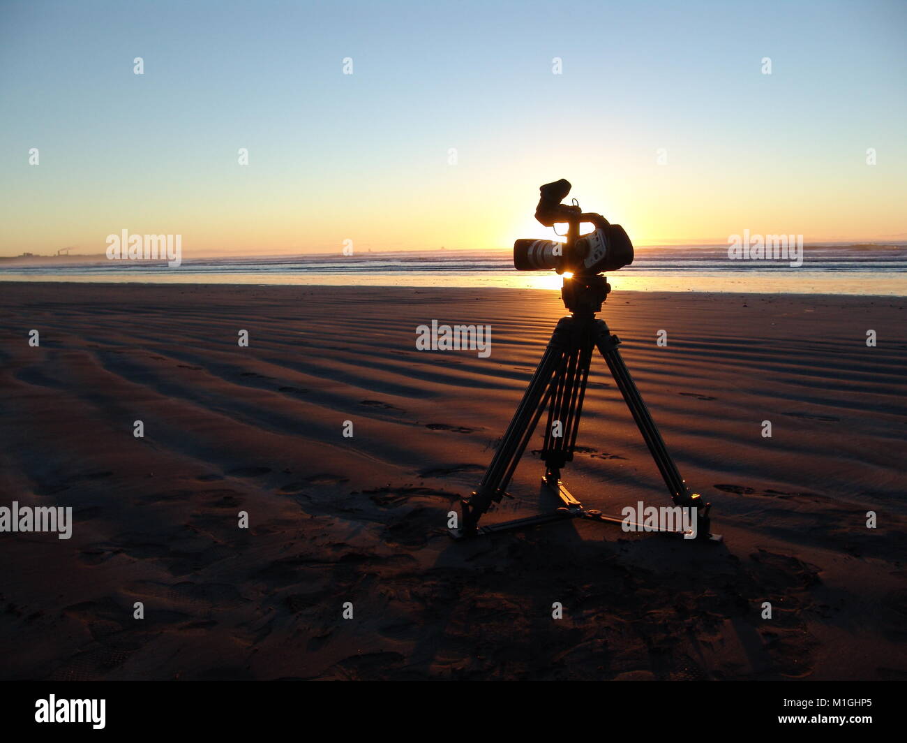 Digital Video Camera on beach during sunset Stock Photo - Alamy