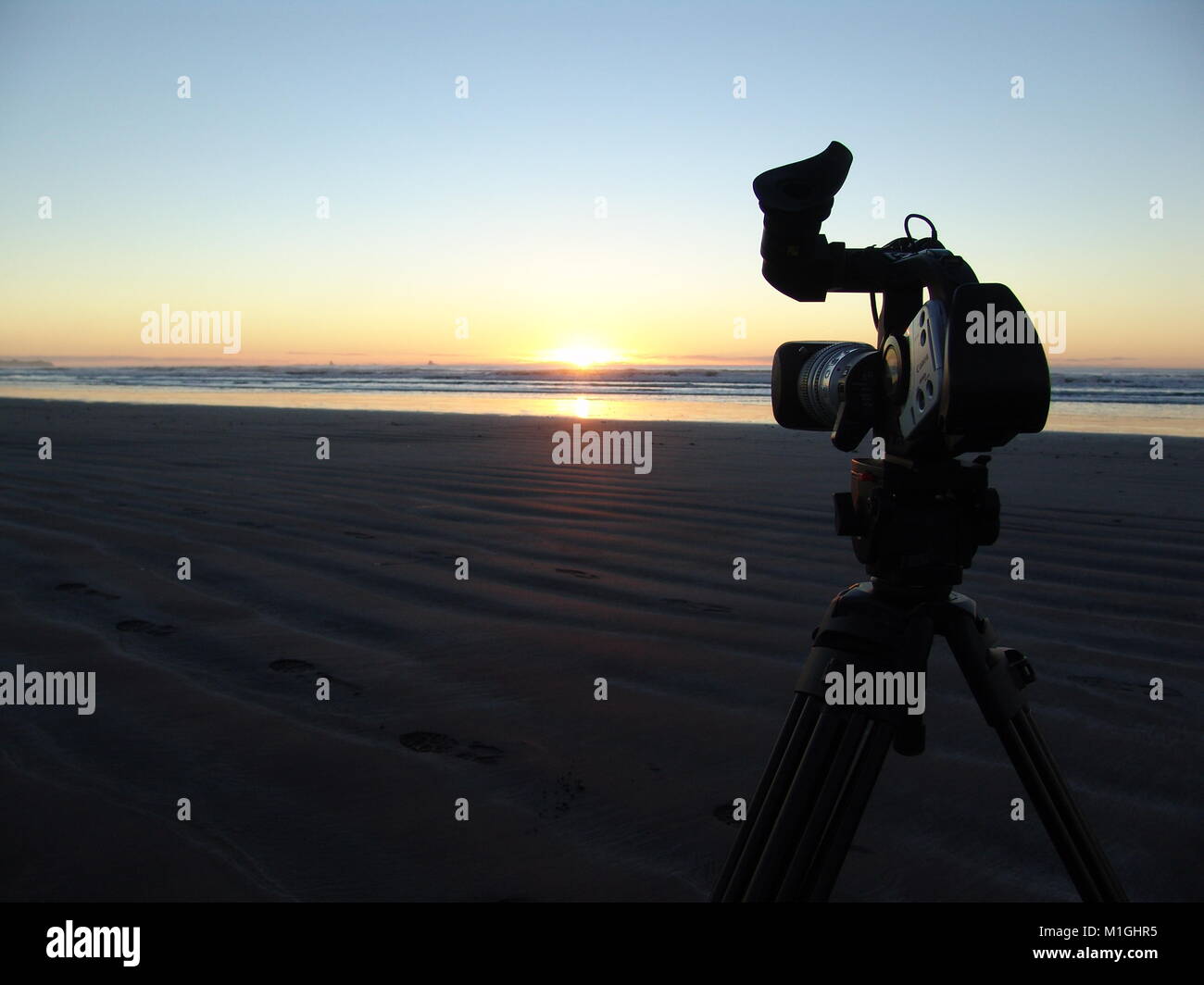 Digital Video Camera on beach during sunset Stock Photo - Alamy