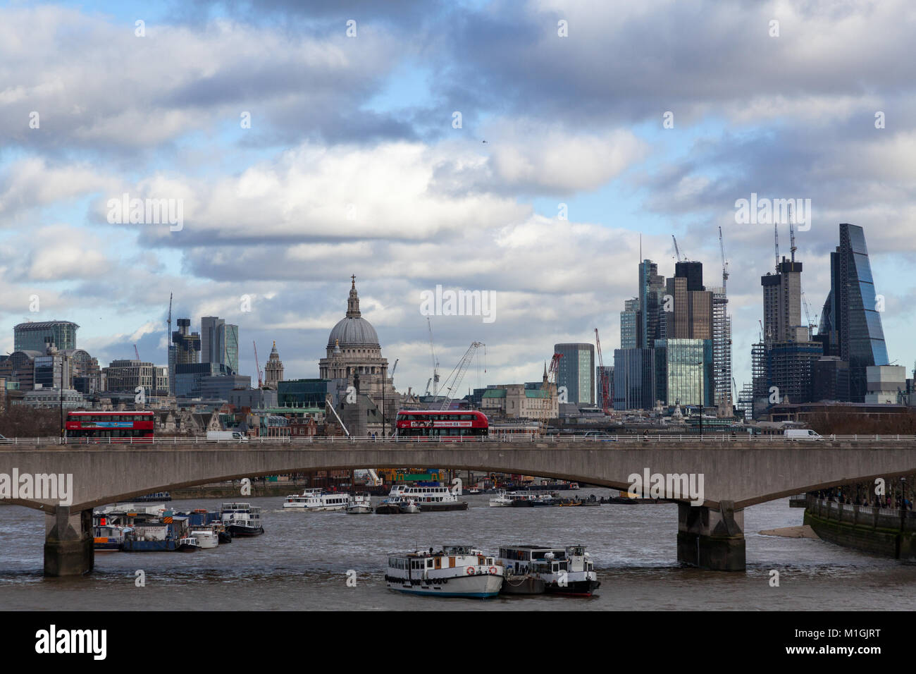 Double decker buses on Waterloo Bridge with St Paul's Cathedral and the ...
