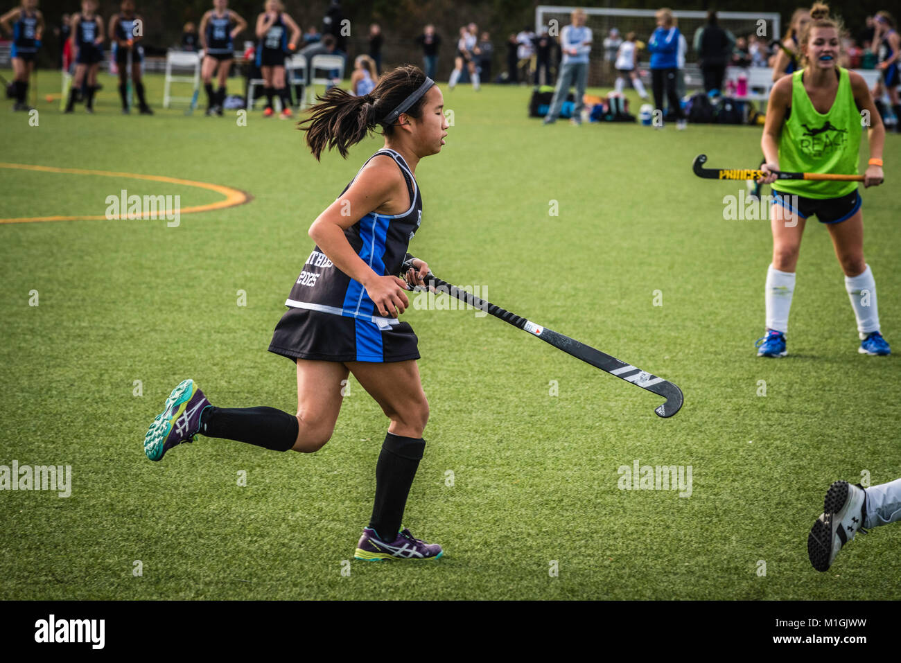 High school girls field hockey competition Stock Photo - Alamy