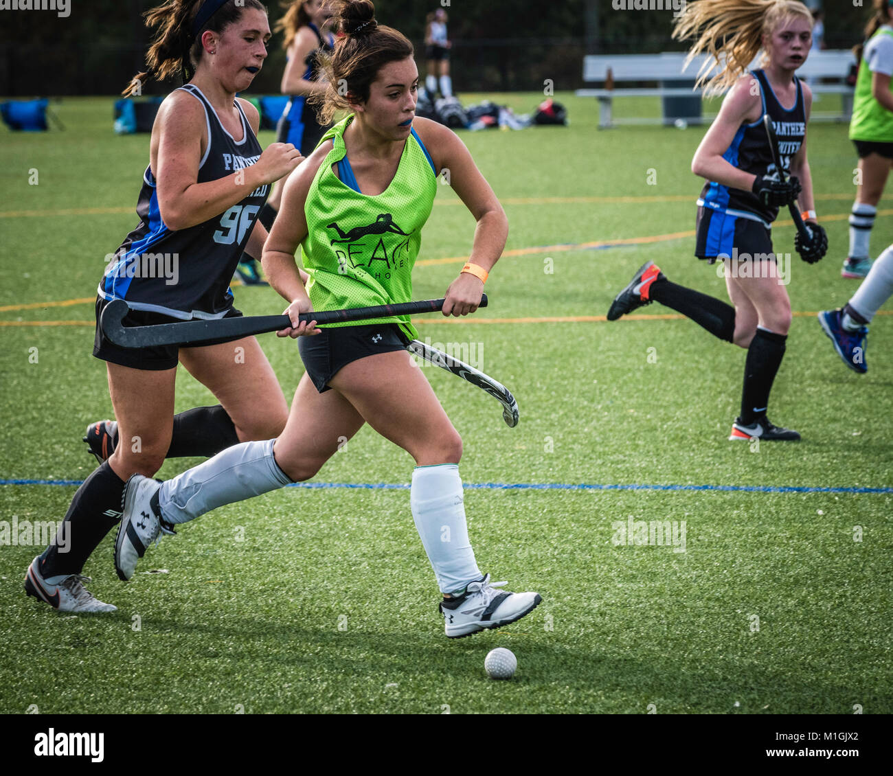 High school girls field hockey competition Stock Photo - Alamy