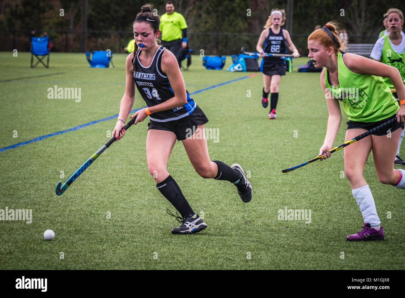 High school girls field hockey competition Stock Photo - Alamy