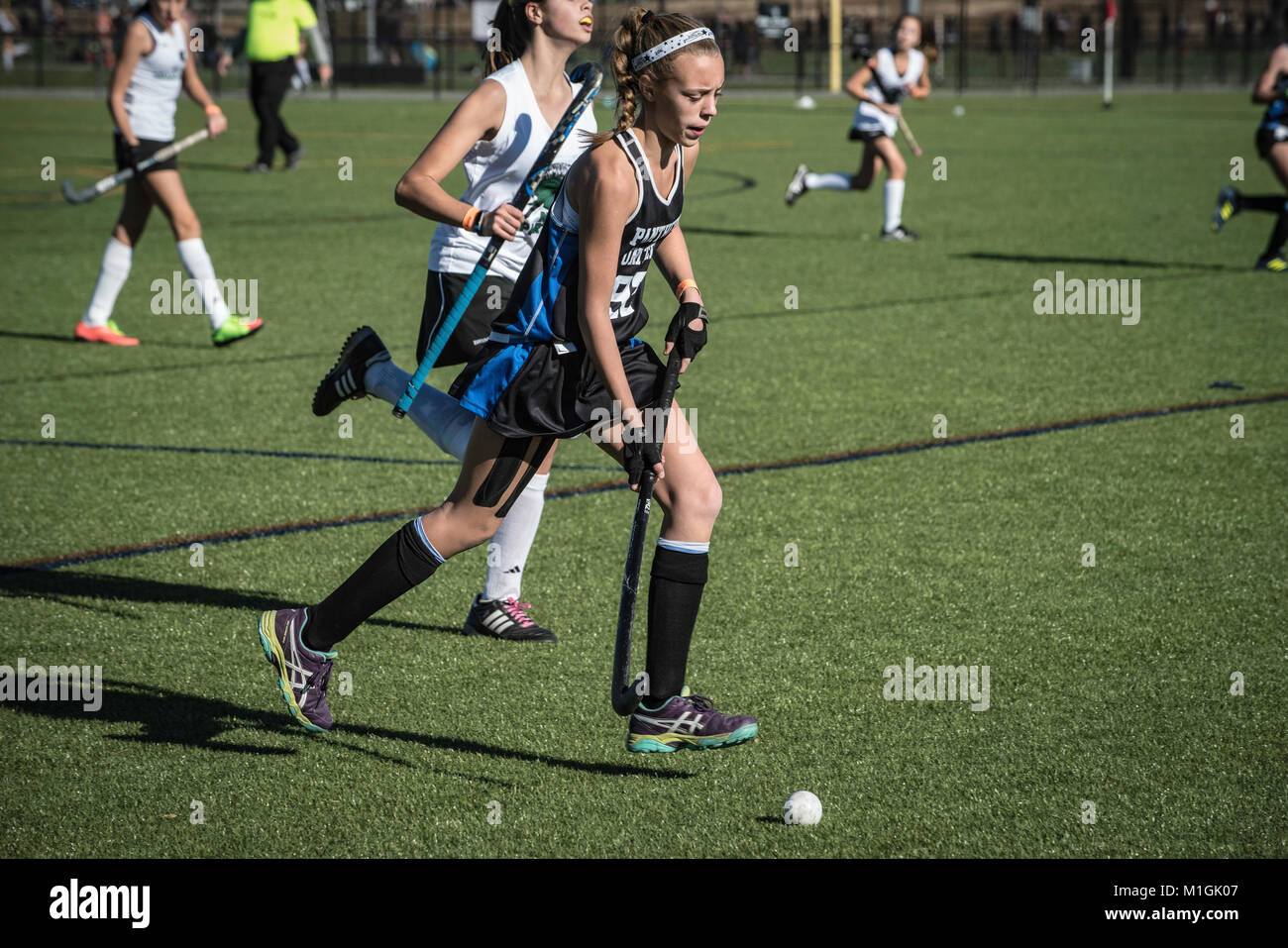 High school girls field hockey competition Stock Photo - Alamy