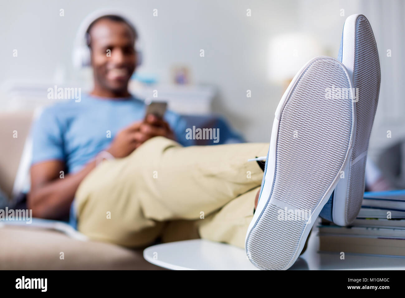 Selective focus of male feet Stock Photo - Alamy