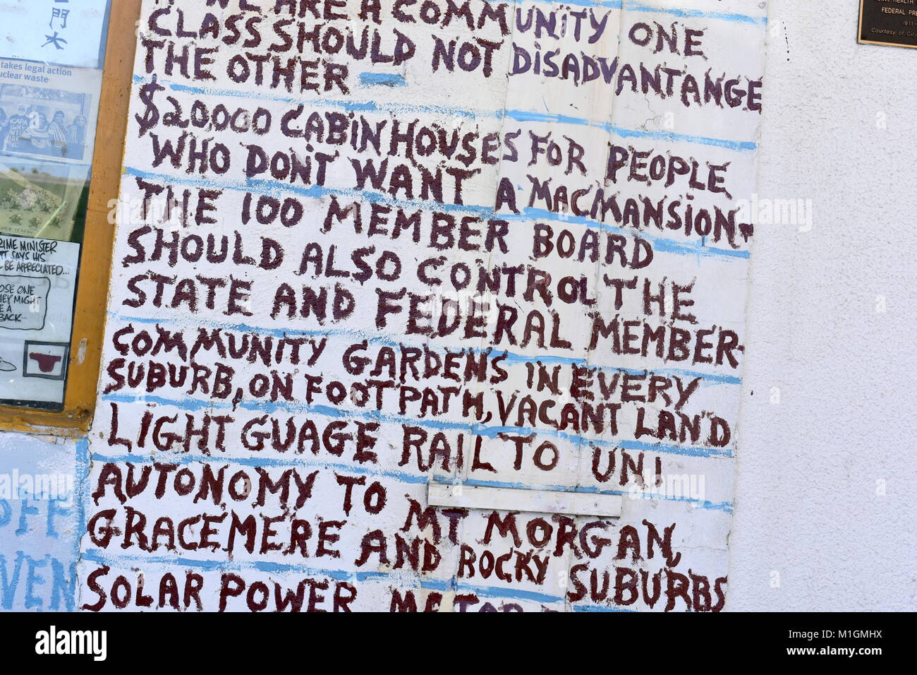 controversial graffiti on shop wall Stock Photo - Alamy