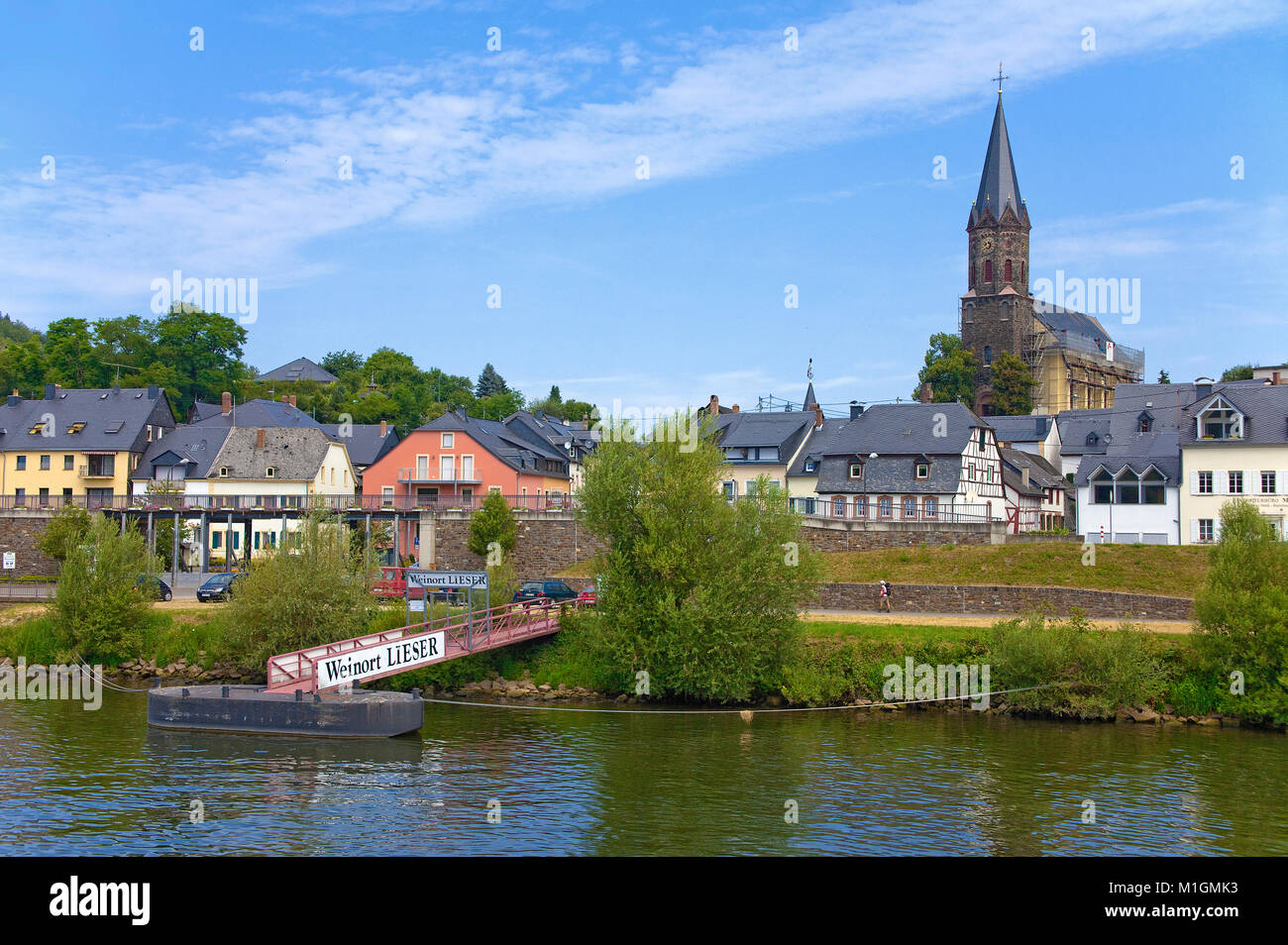 Wine village Lieser with landing stage for excursion ships and catholic ...