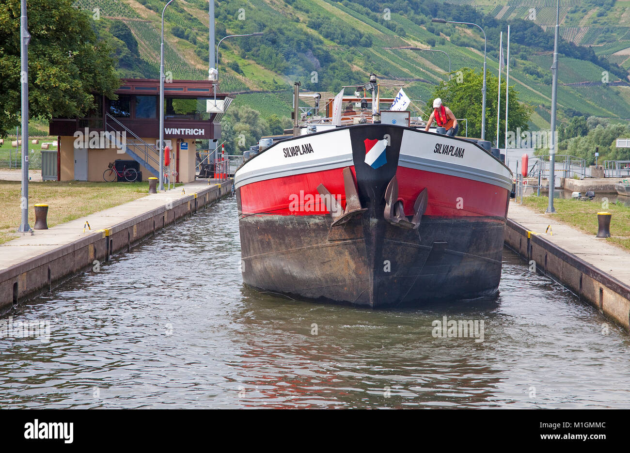 Freighter at the floodgate of Moselle village Wintrich, Moselle river ...