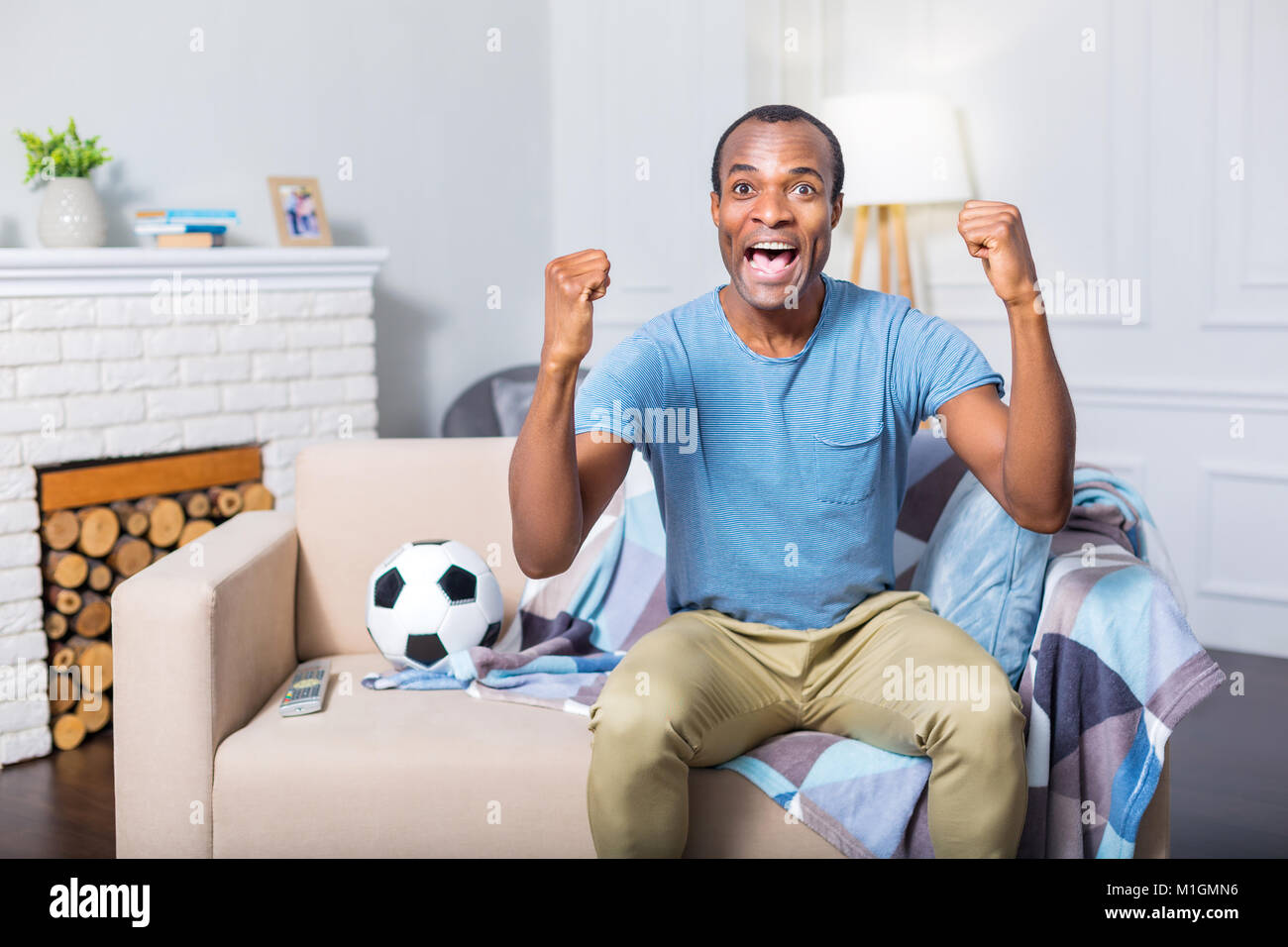 Happy nice man feeling excited Stock Photo - Alamy