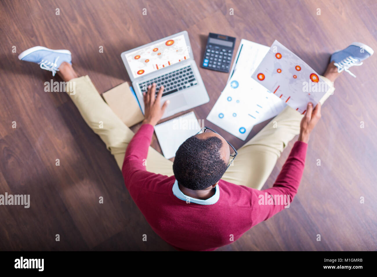 Top view of a smart nice man working Stock Photo - Alamy