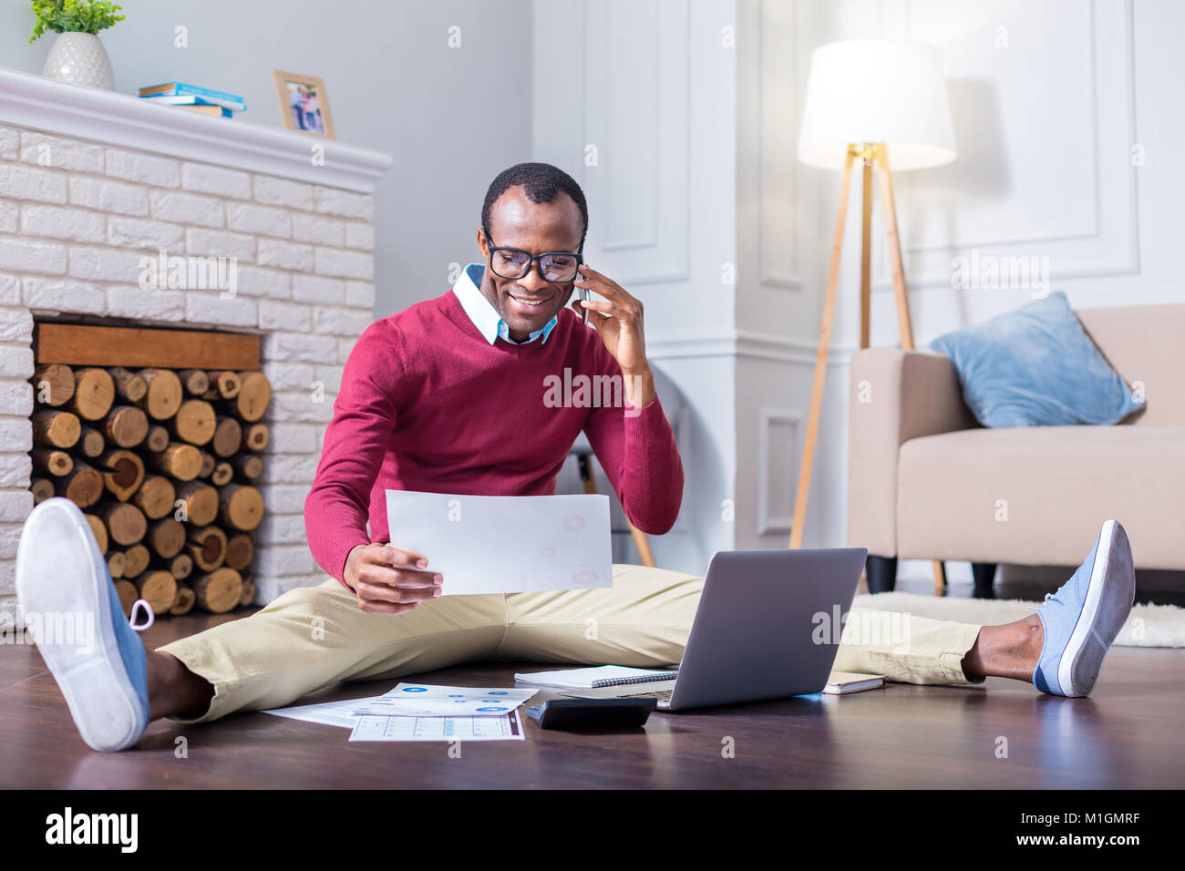 Positive hard working man making a call Stock Photo - Alamy