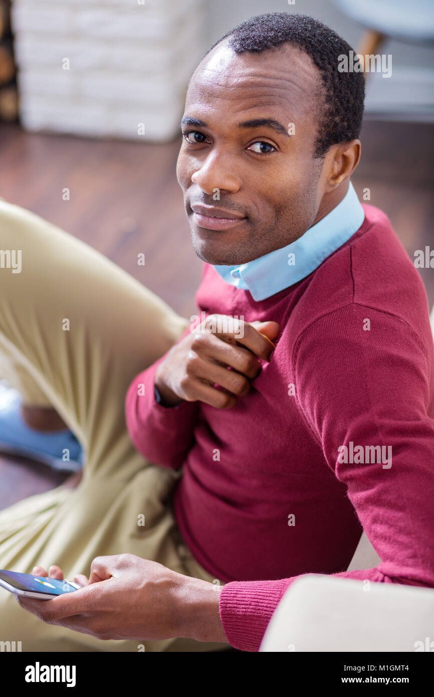 Smart pleasant man looking at you Stock Photo - Alamy