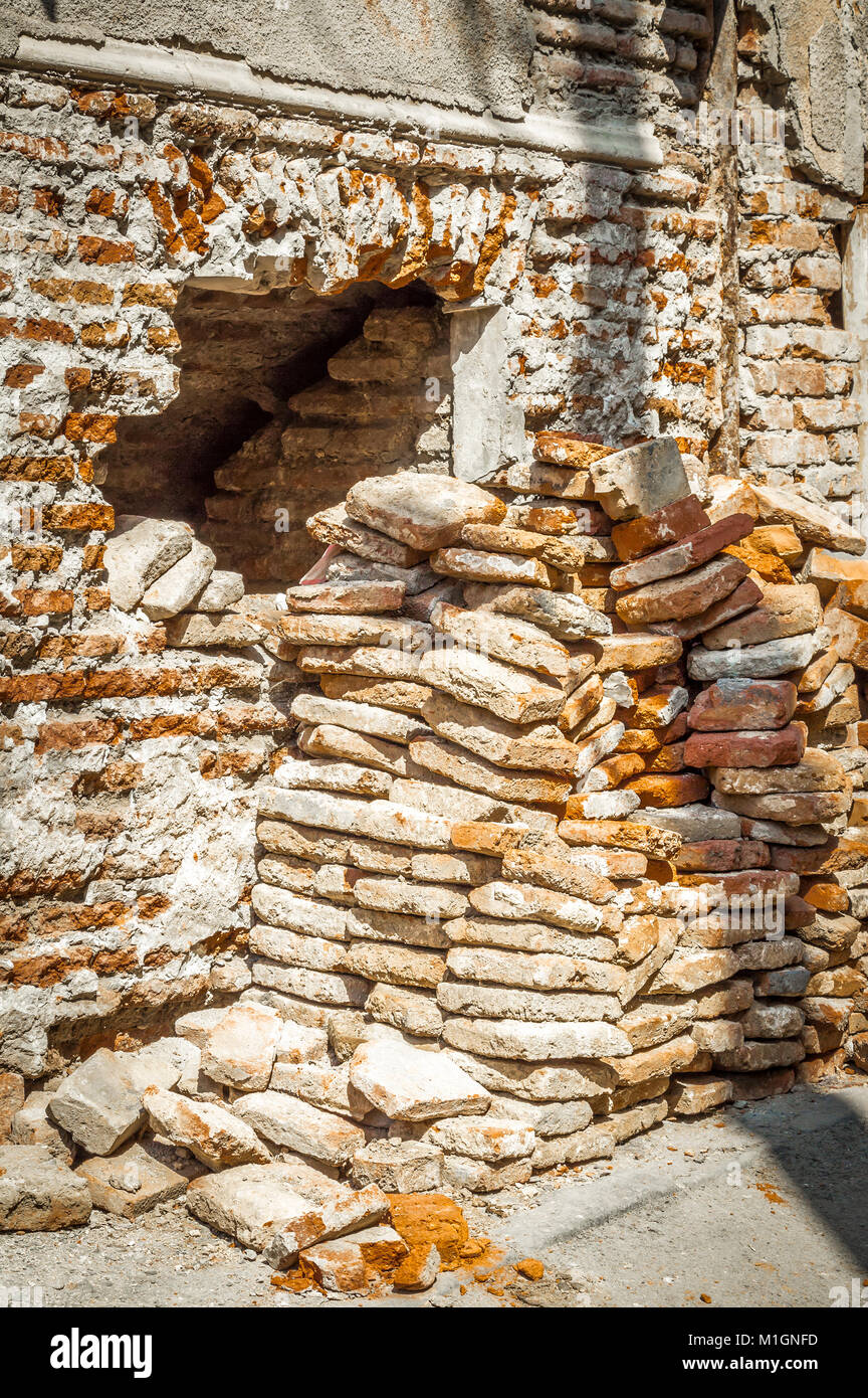 A collapse in the brick wall of an old apartment house Stock Photo - Alamy