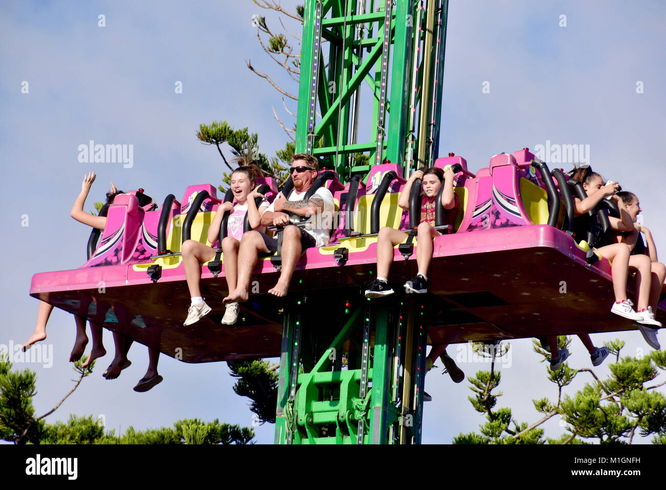 KIDS HAVING FUN ON AN AMUSEMENT PARK RIDE Stock Photo - Alamy