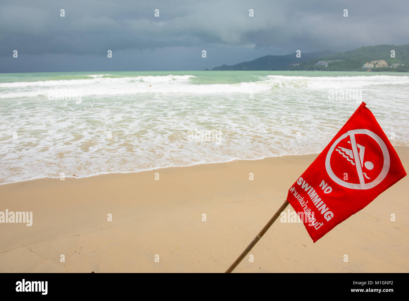 No swimming here sign at the beach at Phuket, Thailand Stock Photo - Alamy
